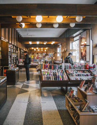 Residential Apartment Building With a Bookstore | Architectuul