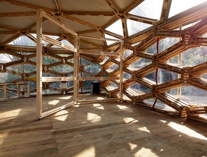 Recycled Pallet Pavillion | Architectuul