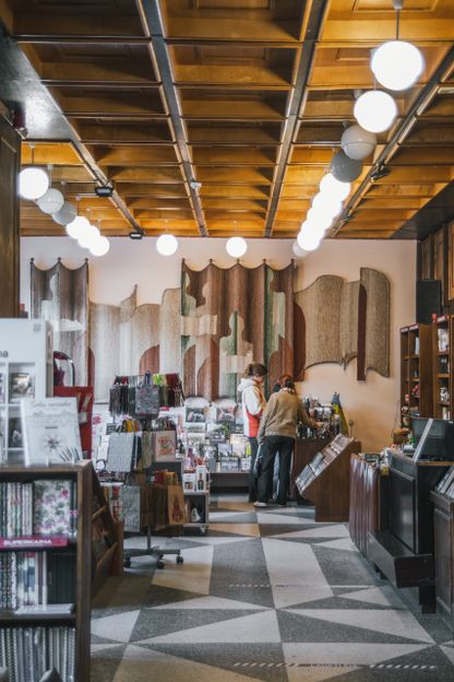 Residential Apartment Building With a Bookstore | Architectuul